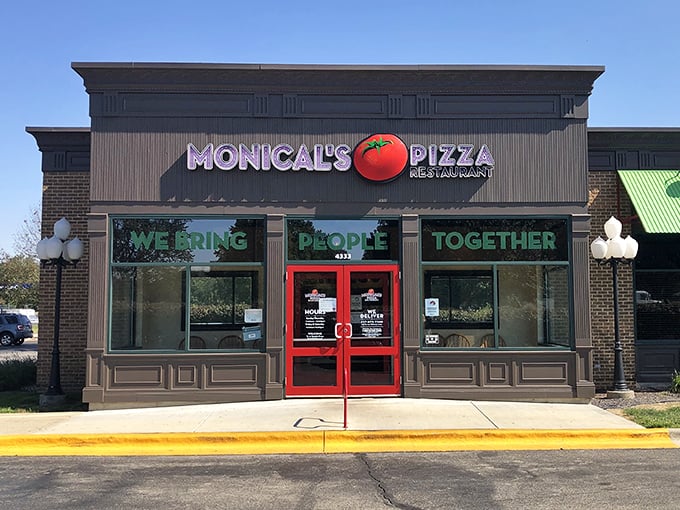 Monical's tomato logo and "We Bring People Together" motto &ndash; truer words were never written about pizza.