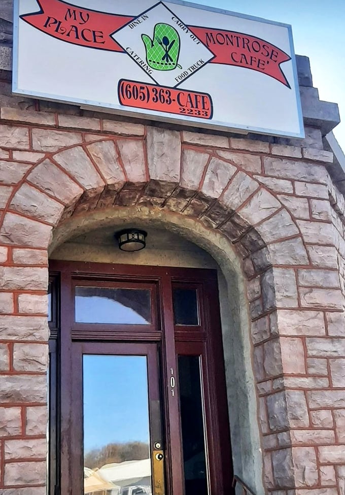 Behind this stone archway lies My Place Cafe, Montrose's best-kept breakfast secret hiding in plain sight.