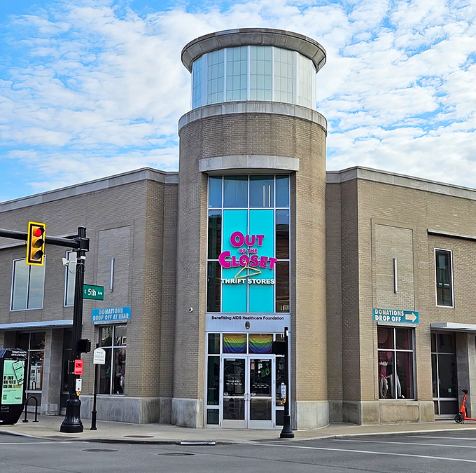 Out of the Closet's distinctive turquoise and pink signage brightens this corner. Shopping with style and purpose.
