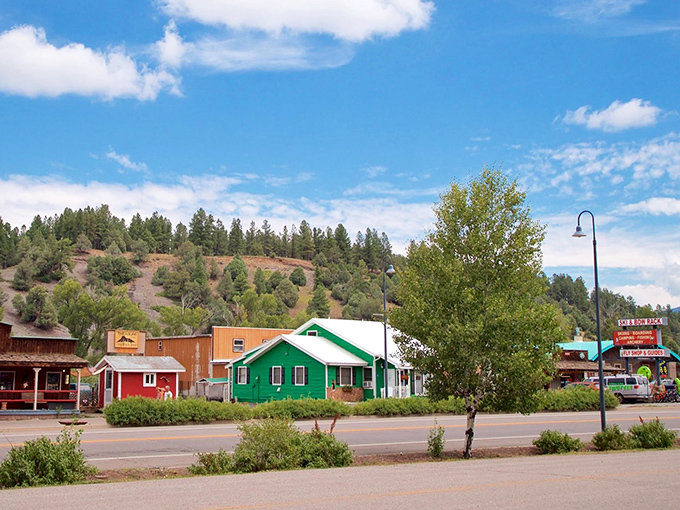 Pagosa Springs' colorful buildings pop against the mountain backdrop. Your retirement savings will thank you for discovering this affordable gem.