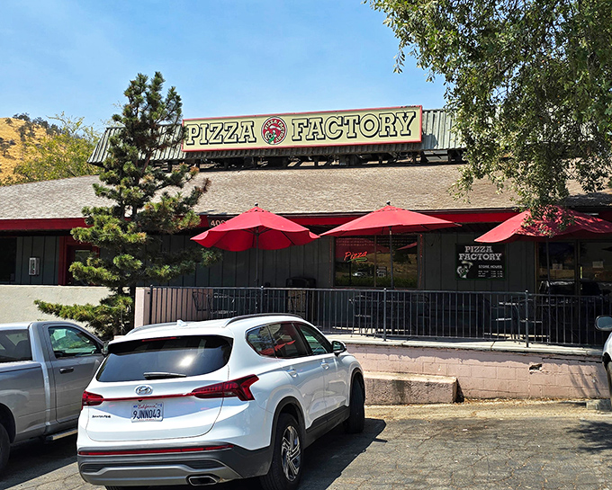 Pizza Factory's rustic exterior blends perfectly with Three Rivers' mountain setting, a welcome sight for hungry Sequoia National Park visitors.