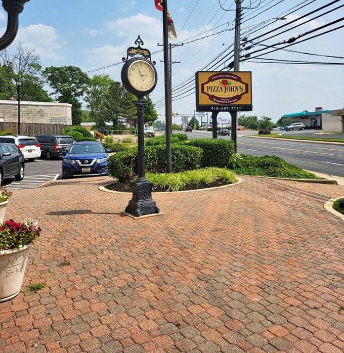 Pizza John's golden Mediterranean palace rises like a delicious mirage in the Essex landscape of dreams. 