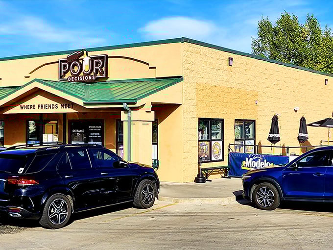 Pour Decisions' cheerful yellow building with green trim promises exactly what the sign says &ndash; a place "Where Friends Meet" for great burgers.