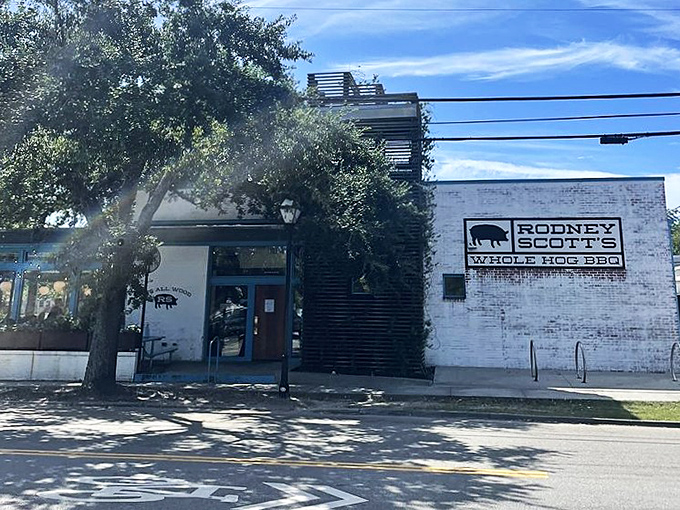 When a BBQ joint displays "Whole Hog BBQ" this proudly on the wall, you know they're not messing around with tradition.