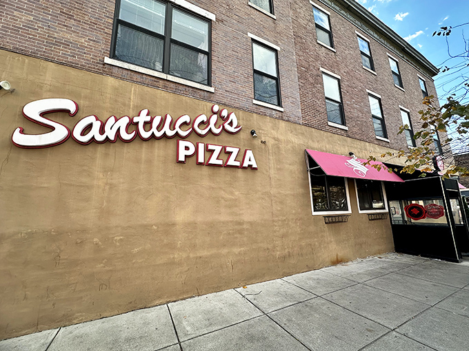 Santucci's understated exterior hides their revolutionary approach to pizza &ndash; sauce on top, cheese underneath!