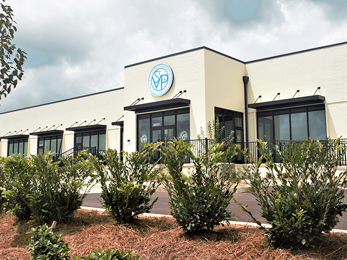 Fresh landscaping and clean brick exterior show this charitable operation takes pride in presentation while keeping prices wonderfully low.