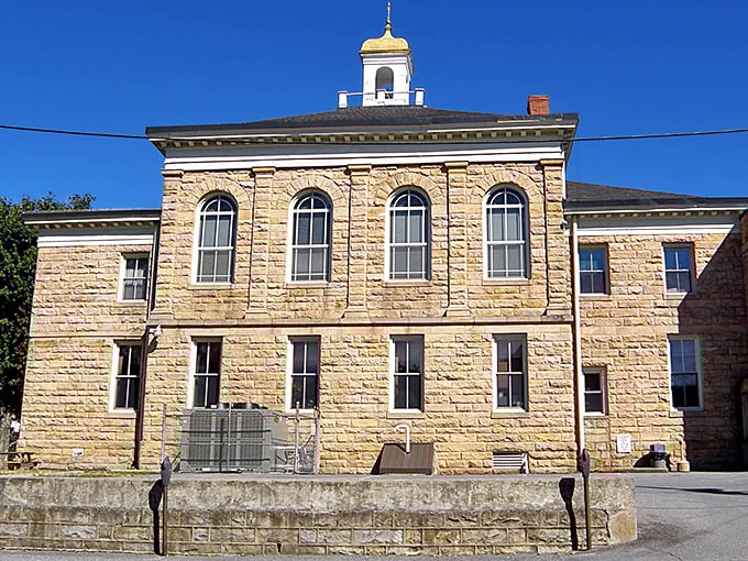 Summersville's golden sandstone courthouse gleams in the sunlight like a historical treasure chest. That little cupola on top is the architectural equivalent of a cherry on a sundae.