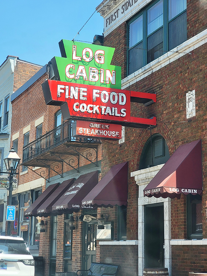 The Log Cabin's neon cuts through Galena's historic charm. Where Greek meets Midwest in an unlikely but delicious union.