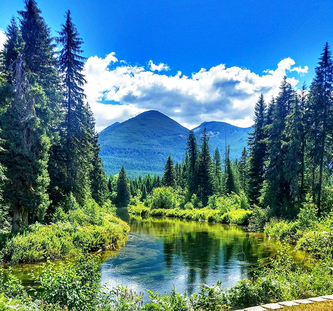 Mother Nature showing off in Troy&mdash;crystal waters reflecting mountains like they're posing for a retirement brochure that won't break the bank.