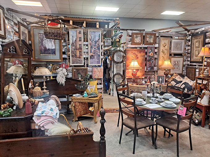 Rustic charm fills this cozy Two Fat Friends booth, where vintage furniture, warm lamplight, and walls of artwork create a treasure-packed nook begging to be explored.