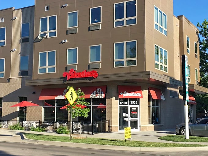 Valentino's modern digs house pizza traditions that have fueled Husker fans and Lincoln families through victory and defeat.