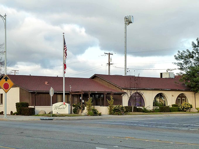 Wasco's community center flies the flag proudly in a town where civic pride meets affordable living.