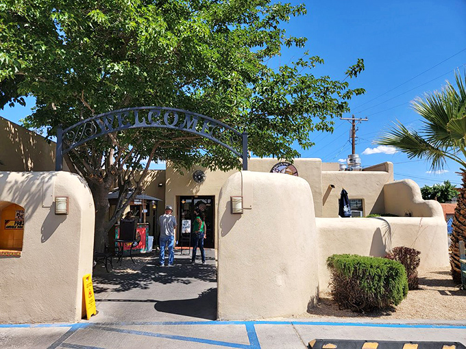 Step through this inviting archway into a world where hot dogs meet authentic New Mexican flavors. The courtyard beckons!