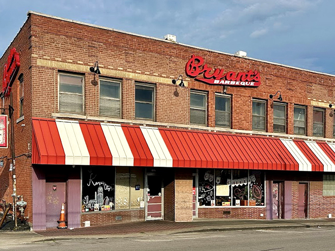 The striped awning at Arthur Bryant's has sheltered generations of barbecue lovers waiting for their turn at greatness.
