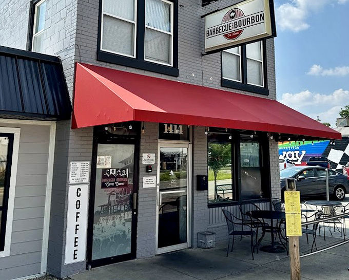 That red awning is like a runway light guiding hungry planes to BBQ paradise. Barbecue and Bourbon's storefront screams "comfort food ahead!"