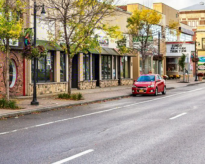 Autumn touches Batavia's storefronts with golden highlights, while the local theater promises Sunday entertainment that costs less than a fancy coffee in Manhattan.