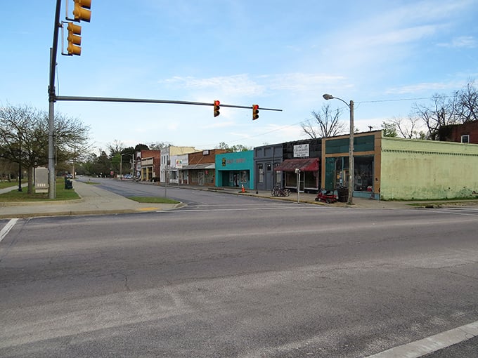 Historic buildings stand shoulder to shoulder, creating the kind of downtown that modern developments try desperately to replicate.