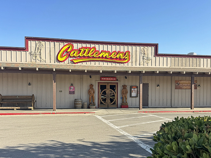 Morning light on Cattlemen's wooden fa&ccedil;ade hints at the day's grilling to come. When a steakhouse looks this authentic, your taste buds know what's up!