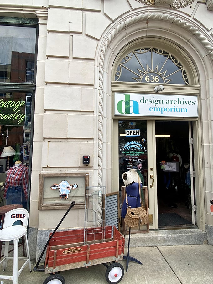 That charming arched doorway at Design Archives feels like a portal to another era. Even the red wagon outside has stories to tell!