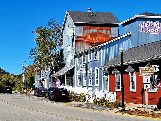 The colorful wooden storefronts of Elkhart Lake create a cheerful welcome for visitors seeking a slower pace and lakeside tranquility.