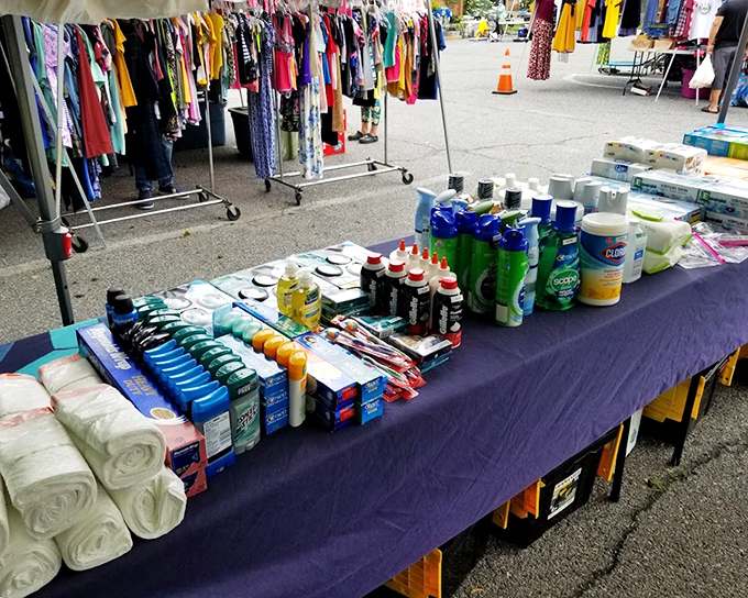 The practical side of treasure hunting shines at St. Mark's in Hyattsville, where household essentials line purple-draped tables with military precision.