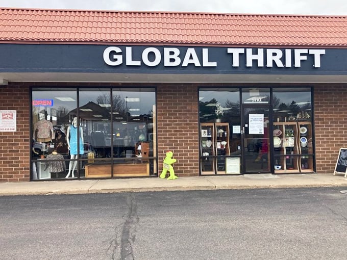 The brick facade and colorful window displays hint at treasures within. This little thrift store packs a big bargain punch.