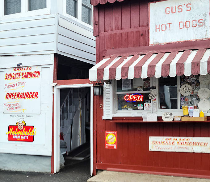 The red building, the striped awning, the promise of "grilled sausage sandwich" &ndash; Gus's is America on a bun.