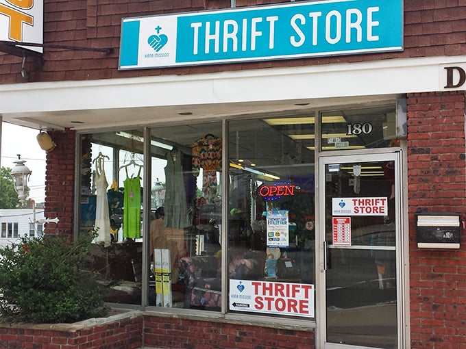 The display window offers tantalizing glimpses of what awaits inside. That "OPEN" sign is practically winking at passing bargain hunters!