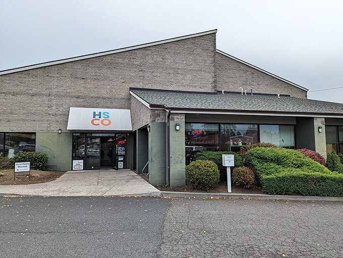 HSCO's storefront might be understated, but those "OPEN" signs promise adventure for thrifters and animal lovers alike.