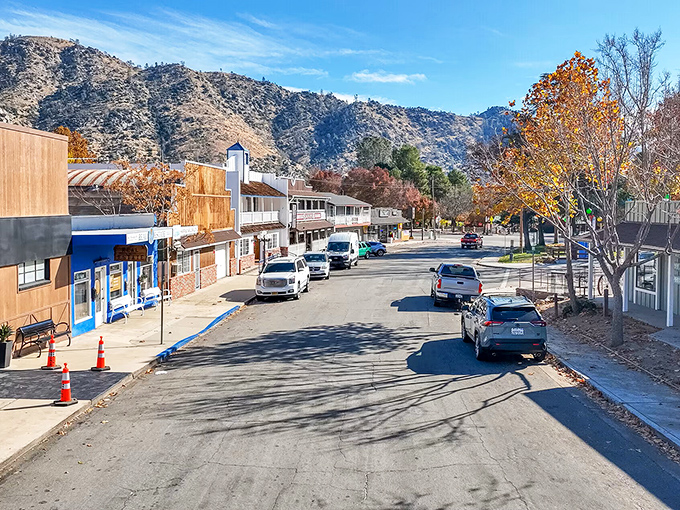 Main Street hugs the mountainside with small-town charm that makes you want to park and explore on foot.