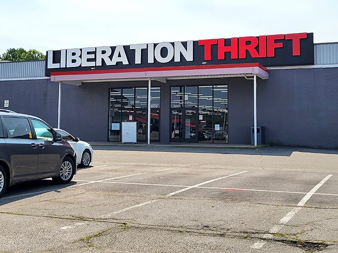 The clean lines and striking colors of Liberation Thrift stand out against the blue sky. A beacon for bargain hunters with big hearts!