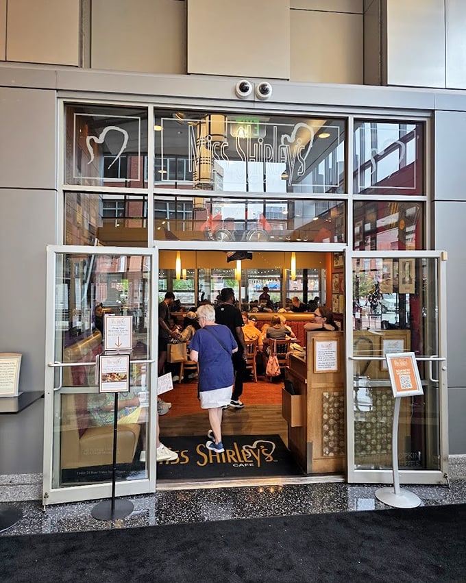 The entrance to this beloved Baltimore institution promises a bustling interior where brunch isn't just a meal, it's an event.