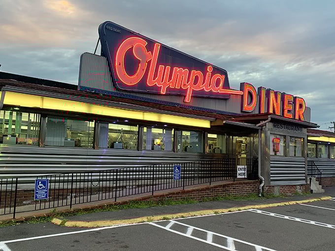 When Olympia's neon lights up at dusk, it's not just a sign&mdash;it's a love letter to American diner tradition.