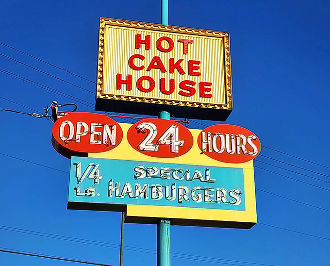The colorful mid-century sign boasts "Open 24 Hours" &ndash; four beautiful words for night owls and early birds alike.
