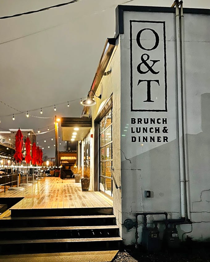 The sleek entrance of O&T beckons with a promise: "Enter here for pizza that's both art and comfort food."