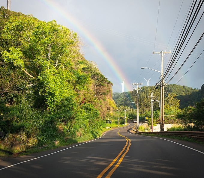 Rainbow road realness! Pūpūkea serves up nature's light show against a backdrop that makes even video game rainbow roads jealous.