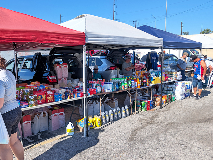 Colorful tents line up like a bargain hunter's rainbow at Quaker City. From snacks to cleaning supplies&mdash;someone's bringing home exactly what they needed!