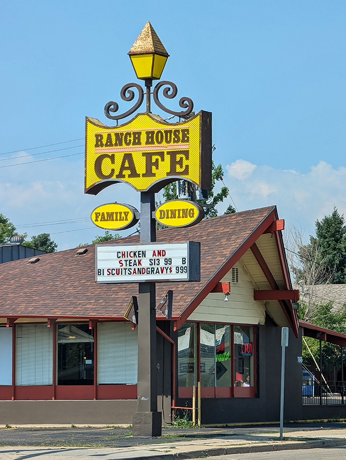 The distinctive yellow Ranch House Cafe sign stands out against the Colorado sky. Those "Family Dining" ovals aren't just decoration&mdash;they're a promise kept.