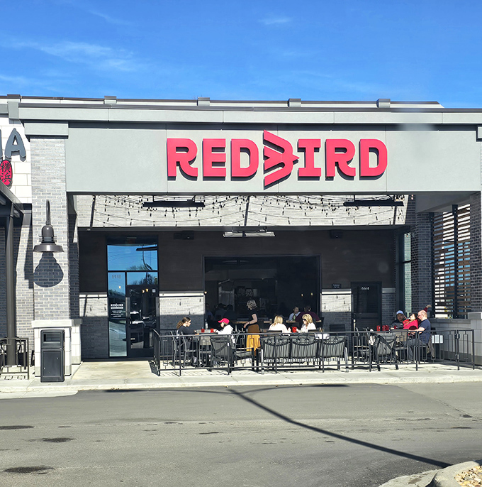That sleek patio setup says "bring your appetite and your friends" for the perfect lunch gathering.