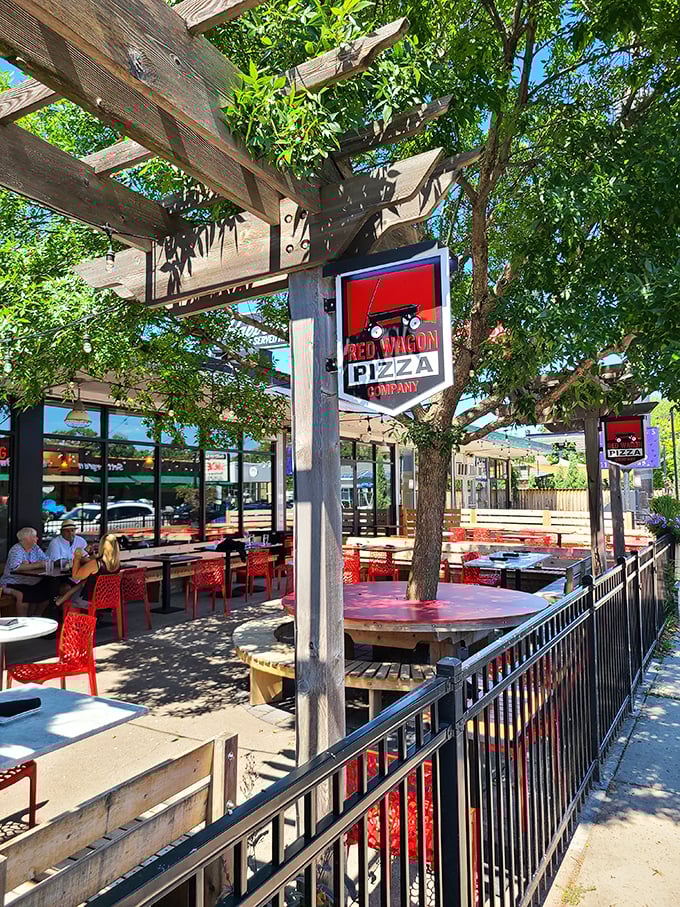 Those red tables and wooden pergola at Red Wagon create an atmosphere as delightful as the pizzas themselves.