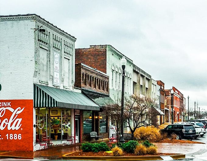 Classic Coca-Cola sign and weathered storefronts make Scottsboro look like someone preserved the 1950s in the best possible way.