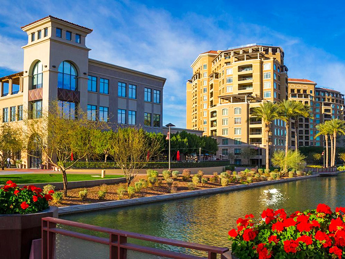 Lush landscaping and modern architecture make Scottsdale's Waterfront a feast for the eyes. Those red flowers add perfect pops of color!