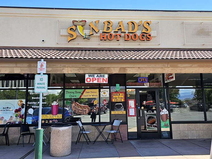 "We are OPEN" declares Sinbad's sign, and thank goodness—these hot dogs are too good to miss even for a day.