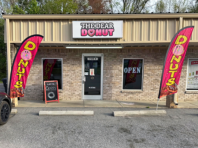 Those colorful flags wave like beacons, announcing "fresh donuts here" to anyone within a three-block radius.