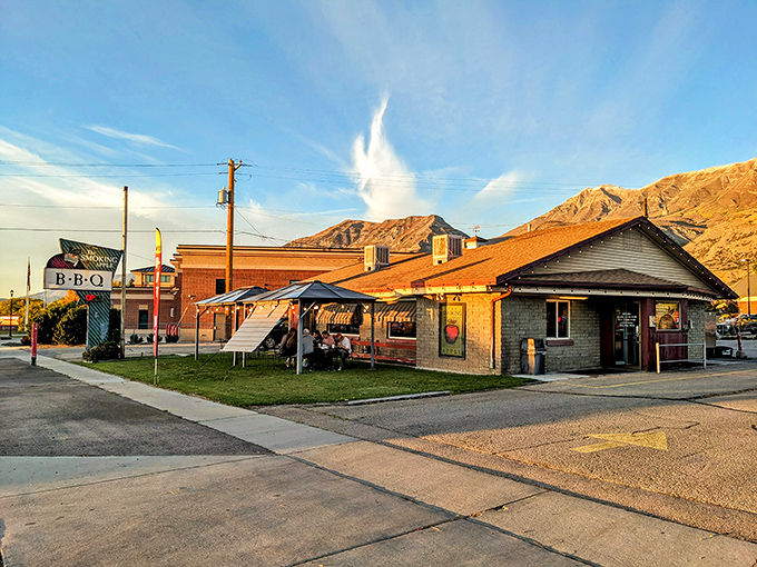 Golden hour at The Smoking Apple turns BBQ into art. Those mountains aren't just backdrop&mdash;they're dinner companions at this Lindon gem.