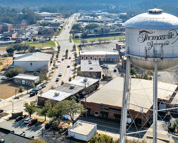 Thomasville's iconic water tower stands as both landmark and lookout, keeping watch over the charming streets below.