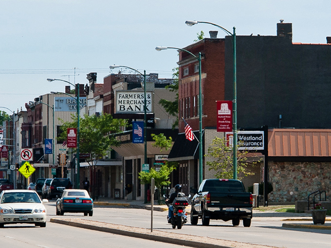Classic American architecture frames a community center where neighbors gather and friendships flourish over shared morning coffee. 