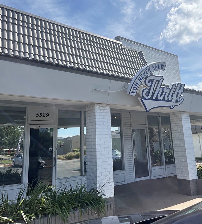 The whimsical sign says it all&mdash;you truly never know what treasures await behind those doors. Thrift shopping as life philosophy!