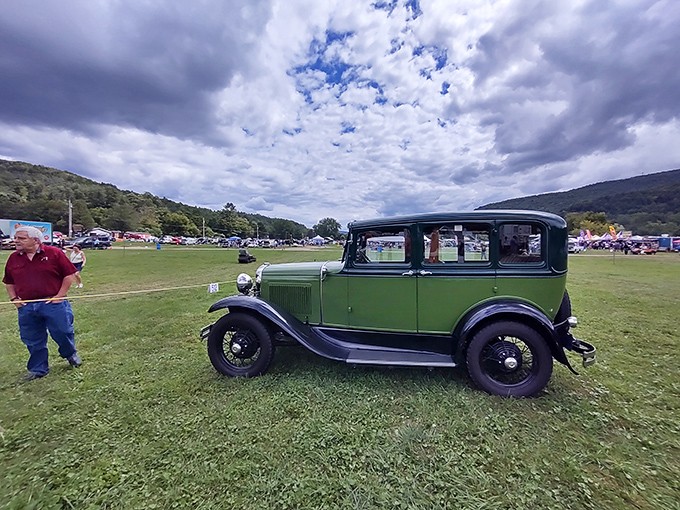 This mint-green Ford isn't just a car; it's a rolling sculpture from when automobiles were still handcrafted marvels.