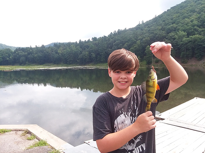 That proud fishing moment when your catch is big enough to brag about but small enough to remain honest.